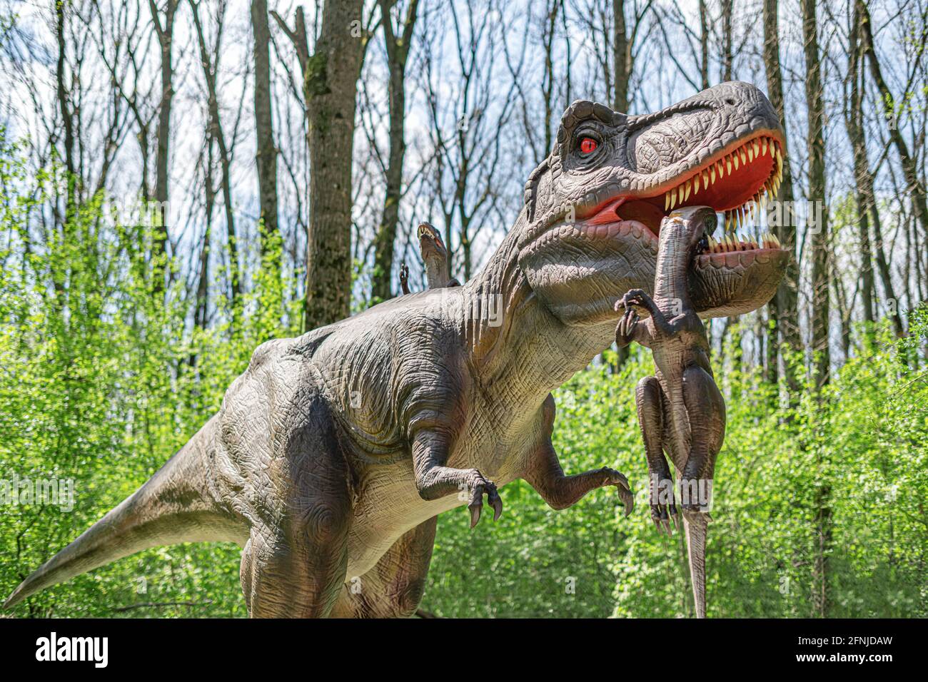 Dinosaur in the jungle Stock Photo - Alamy
