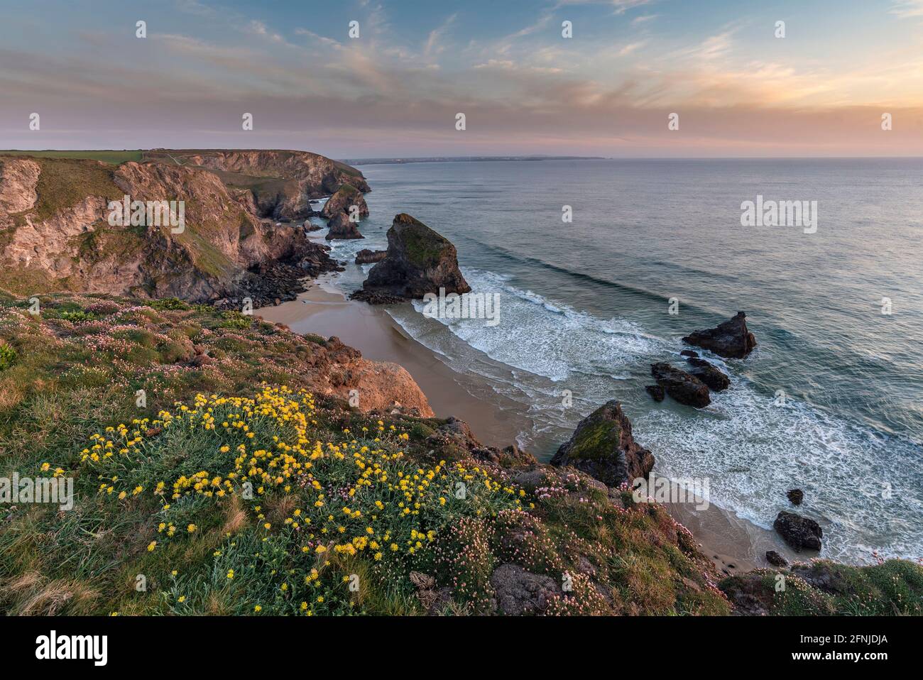 Stunning landscape image during golden hour on Cornwall coastline at ...