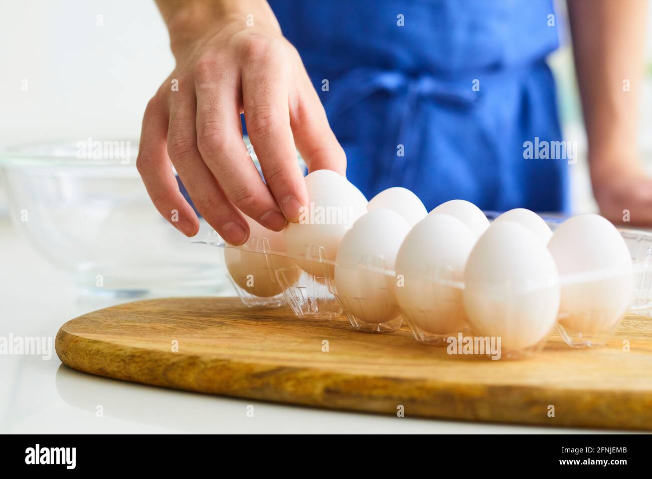 Grabbing egg hi-res stock photography and images - Alamy