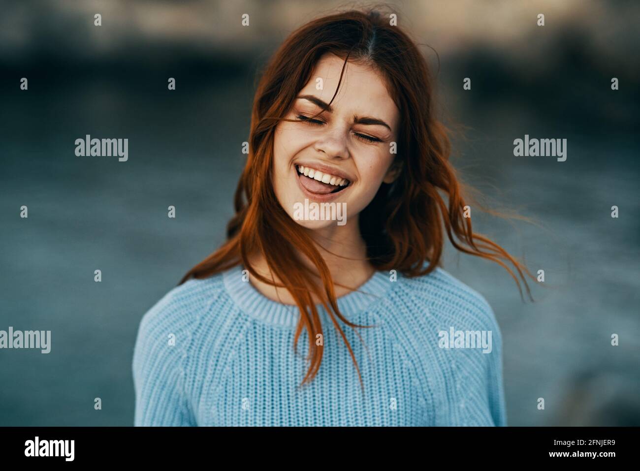 cheerful red-haired woman outdoors nature walk emotions Stock Photo - Alamy