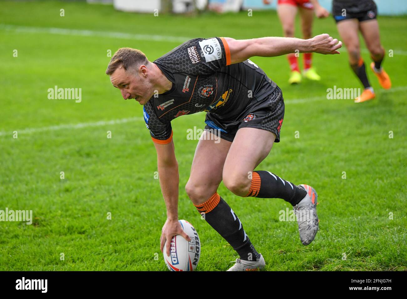 Castleford Tigers' James Clare scores the first try Stock Photo - Alamy
