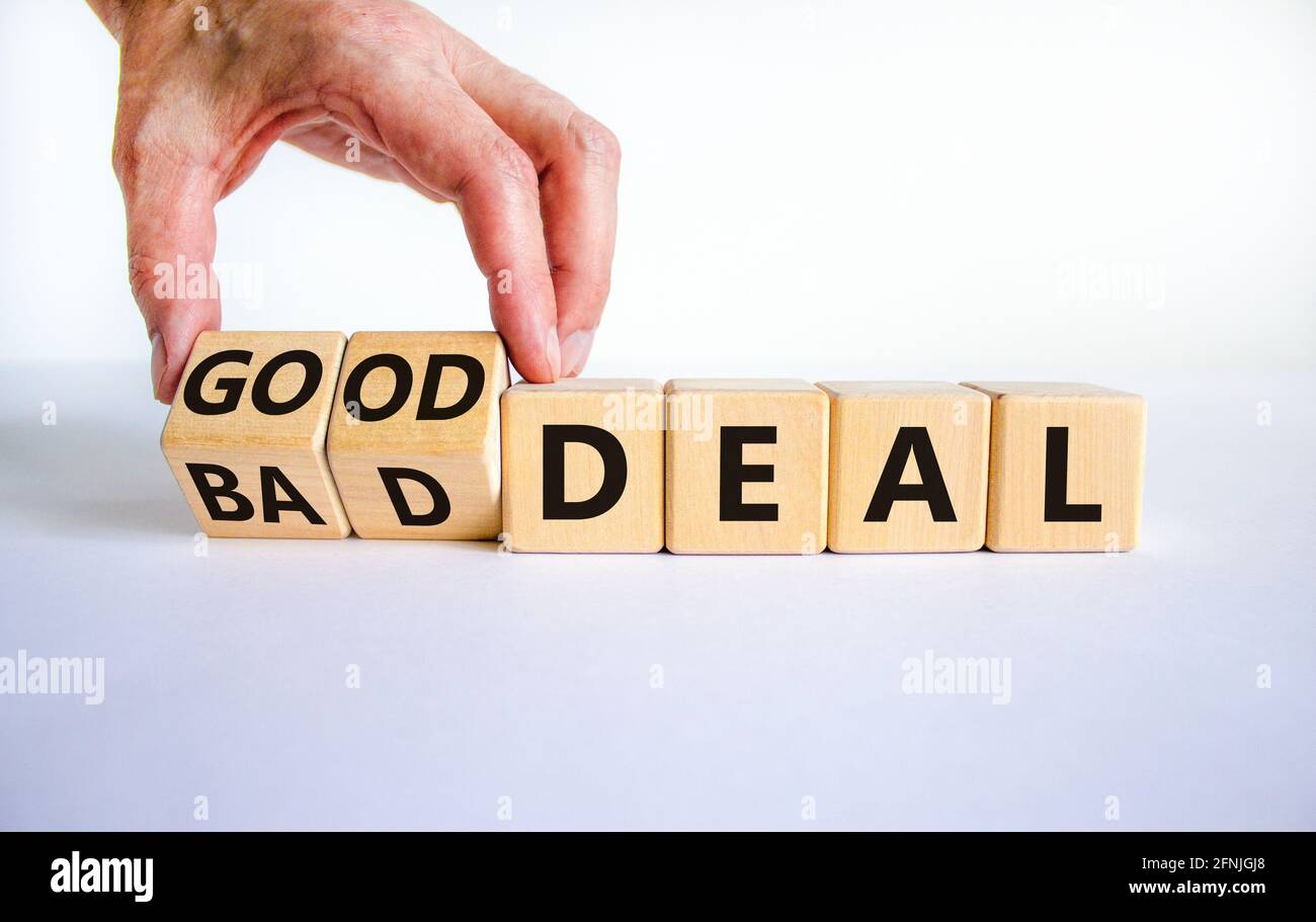 Good or bad deal symbol. Businessman turns wooden cubes and changes ...