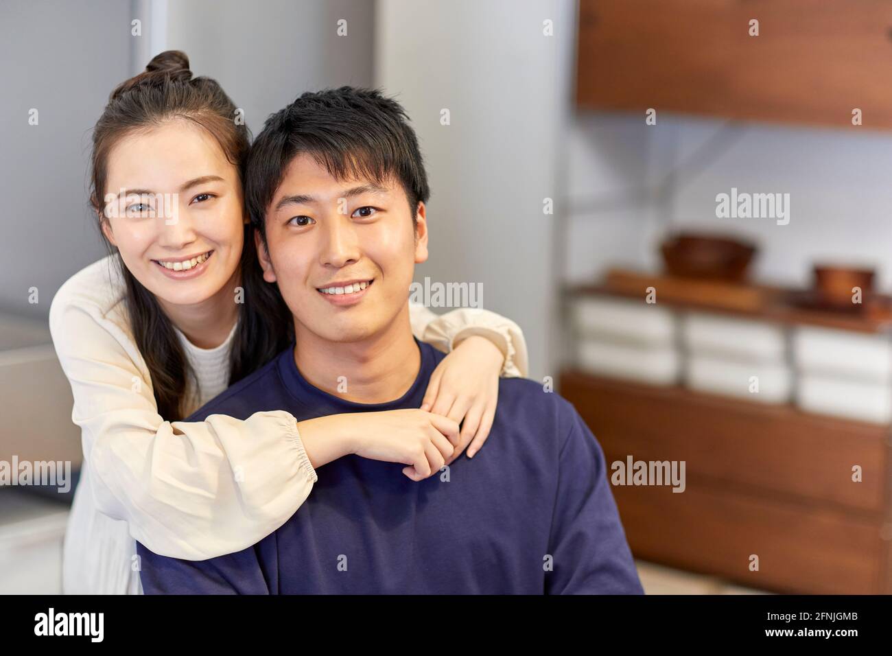 Young Japanese couple at home Stock Photo - Alamy