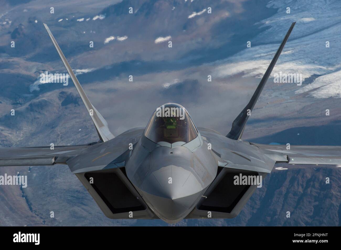 A U.S. Air Force F-22 Raptor stealth fighter jet, maneuvers over the ...