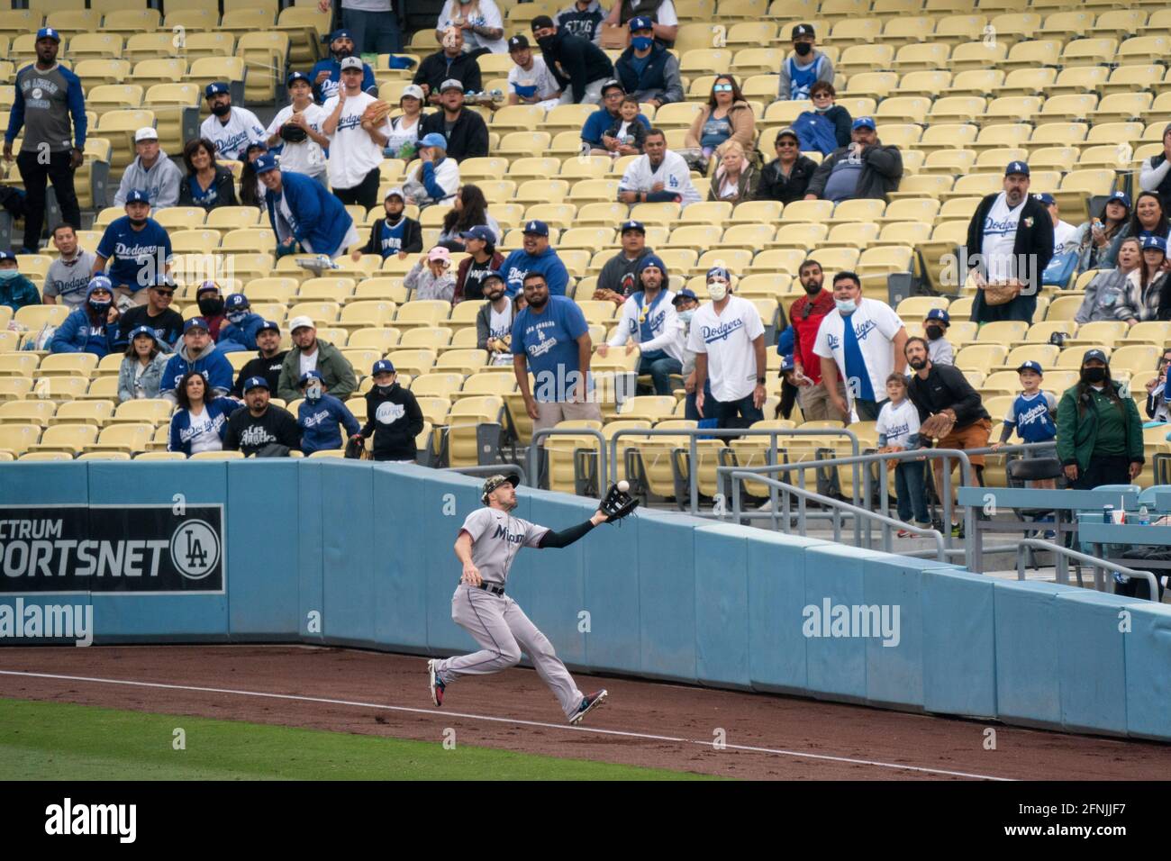 Miami Marlins left fielder Adam Duvall (14) makes a catch during a MLB ...
