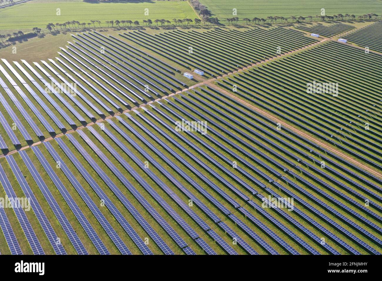 Solar panels in a field Stock Photo - Alamy