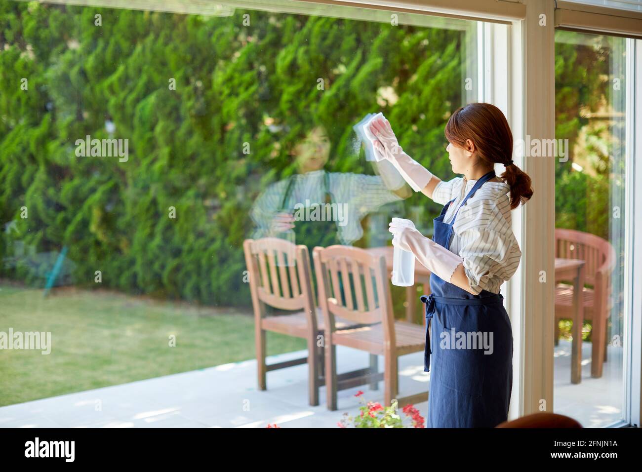Japanese woman cleaning the house Stock Photo - Alamy