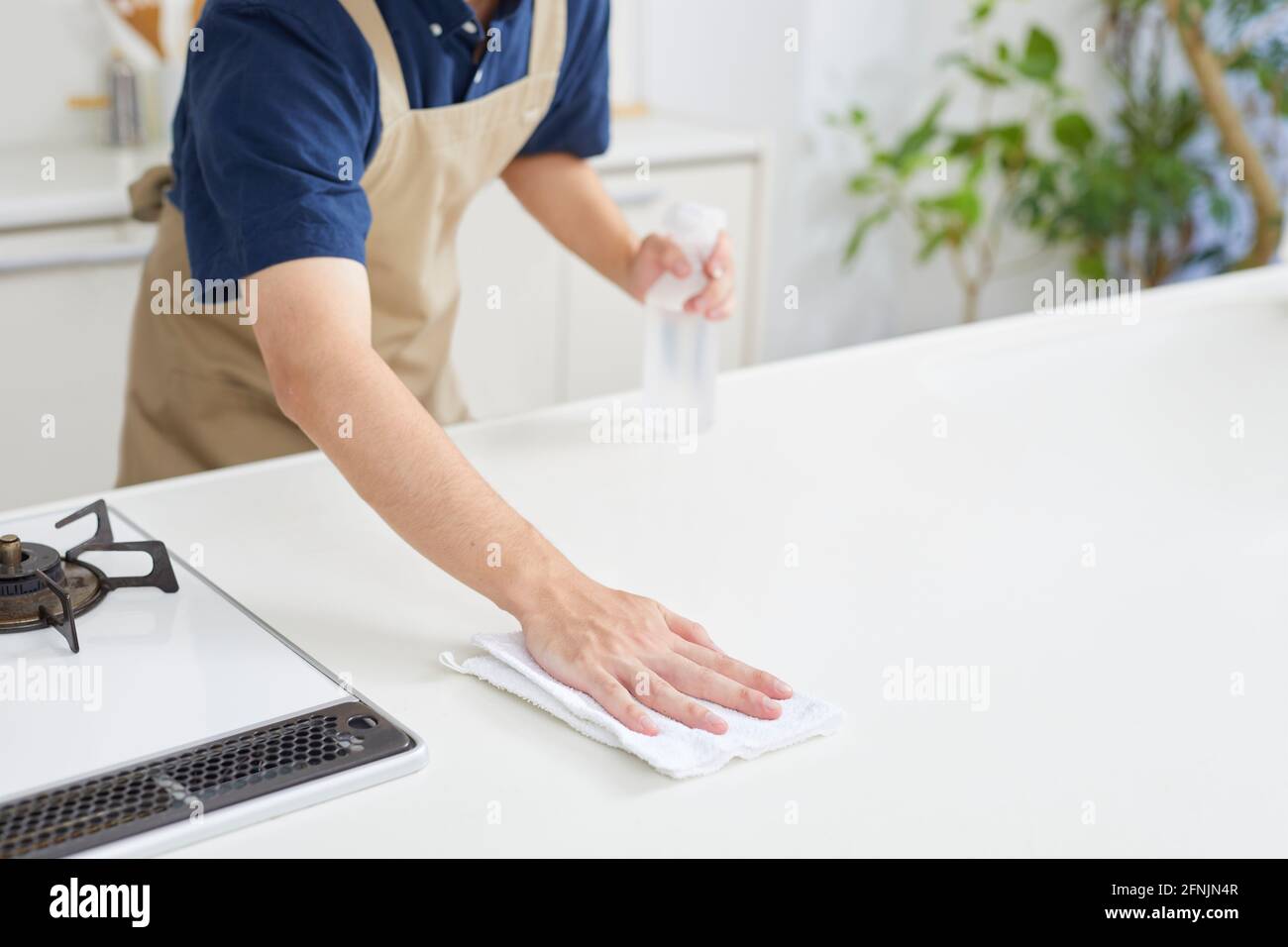 Japanese man cleaning house Stock Photo - Alamy