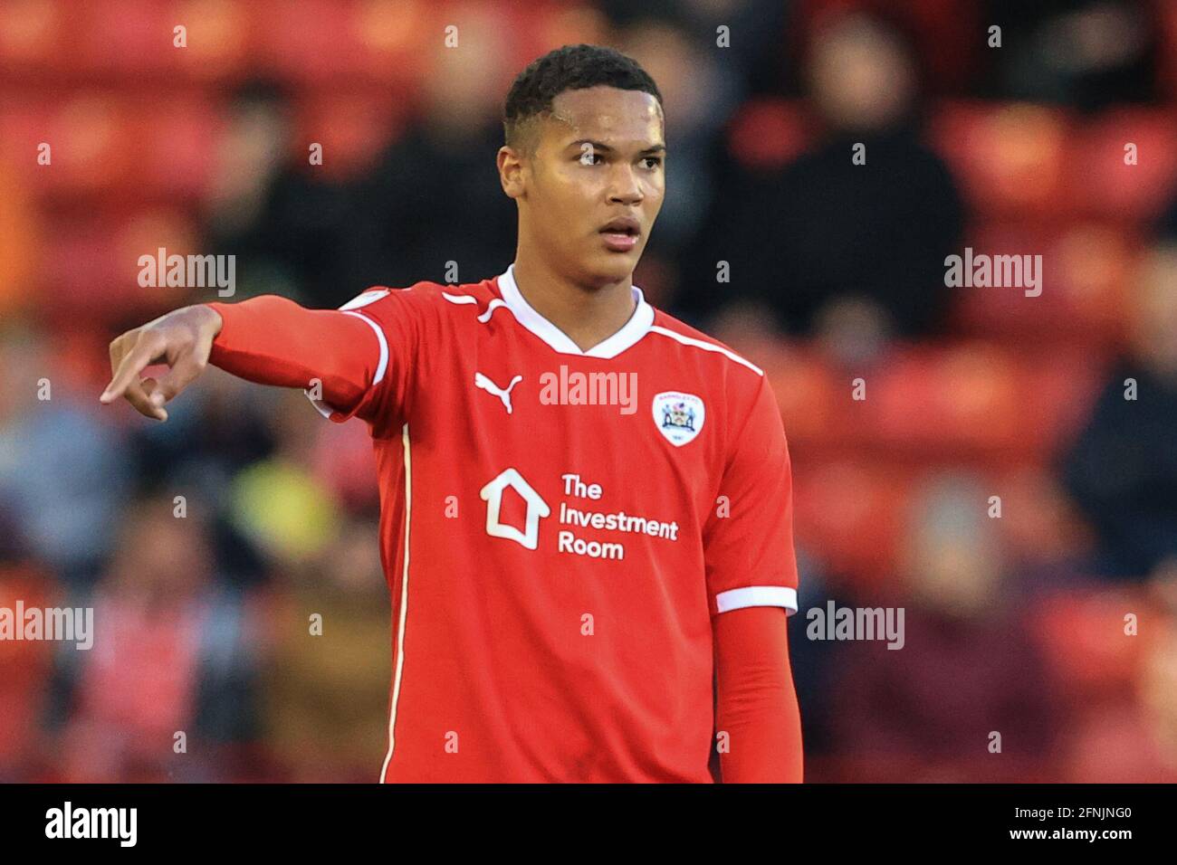 Barnsley, UK. 17th May, 2021. Toby Sibbick #20 of Barnsley gives his ...