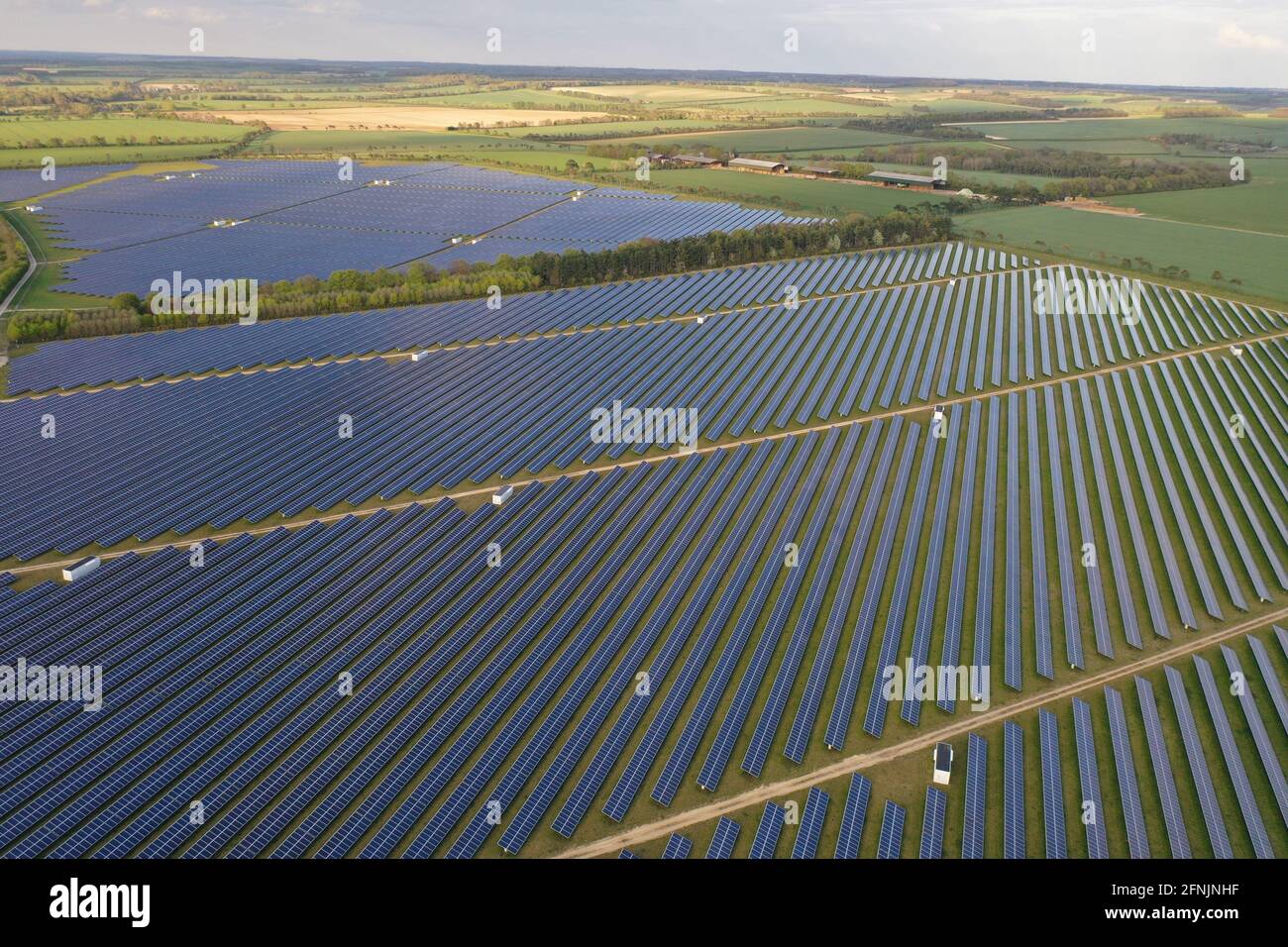 Solar panels in a field Stock Photo - Alamy