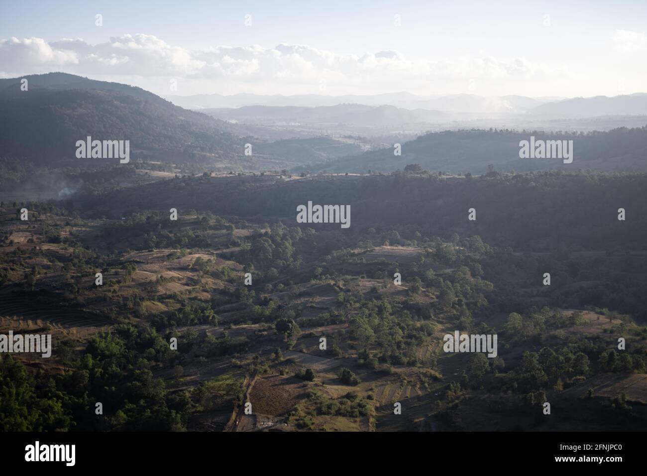 Viewpoint looking out over a beautiful valley landscape with terraced ...