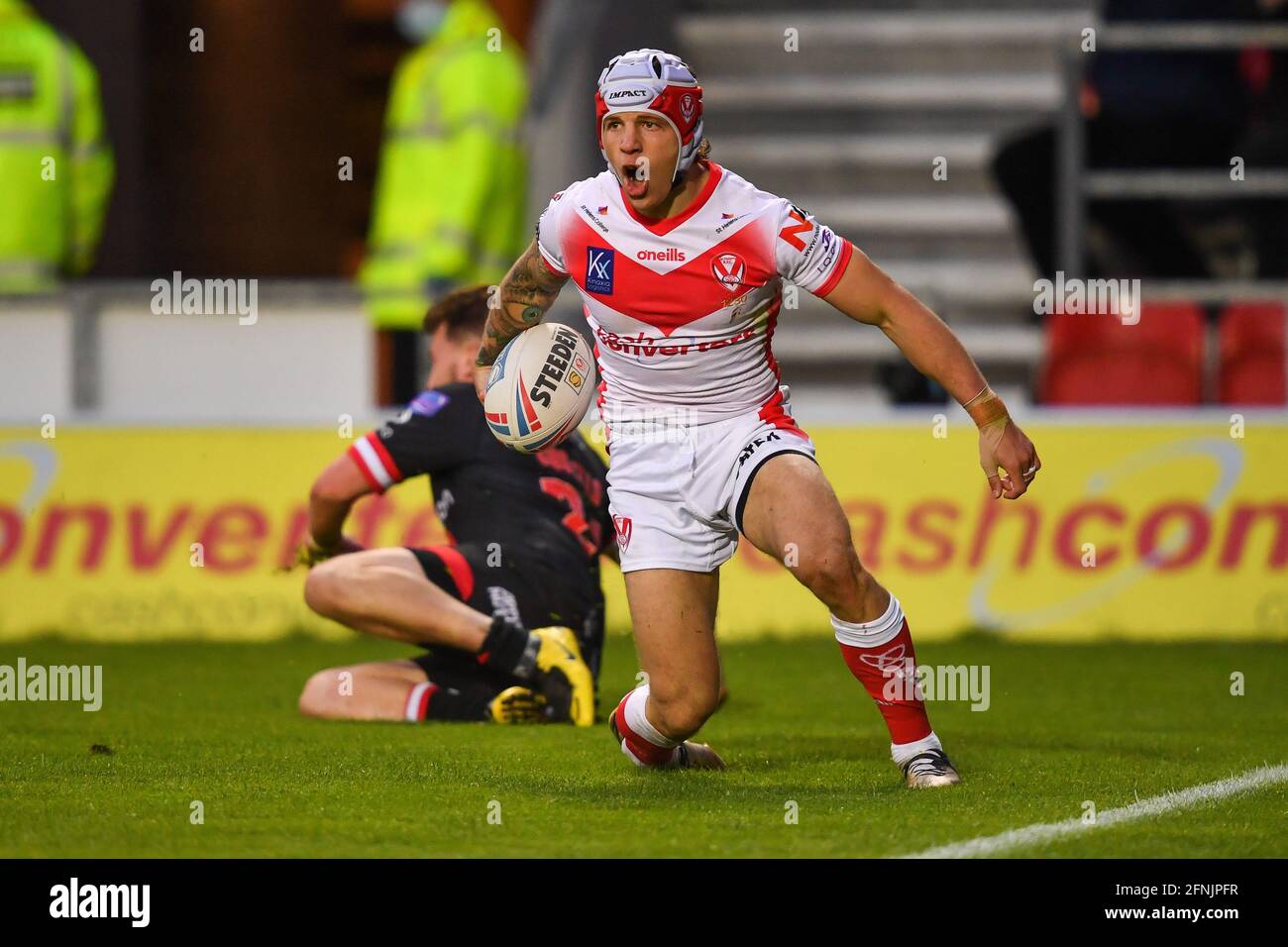 Theo Fages (7) of St Helens celebrates his try Stock Photo - Alamy