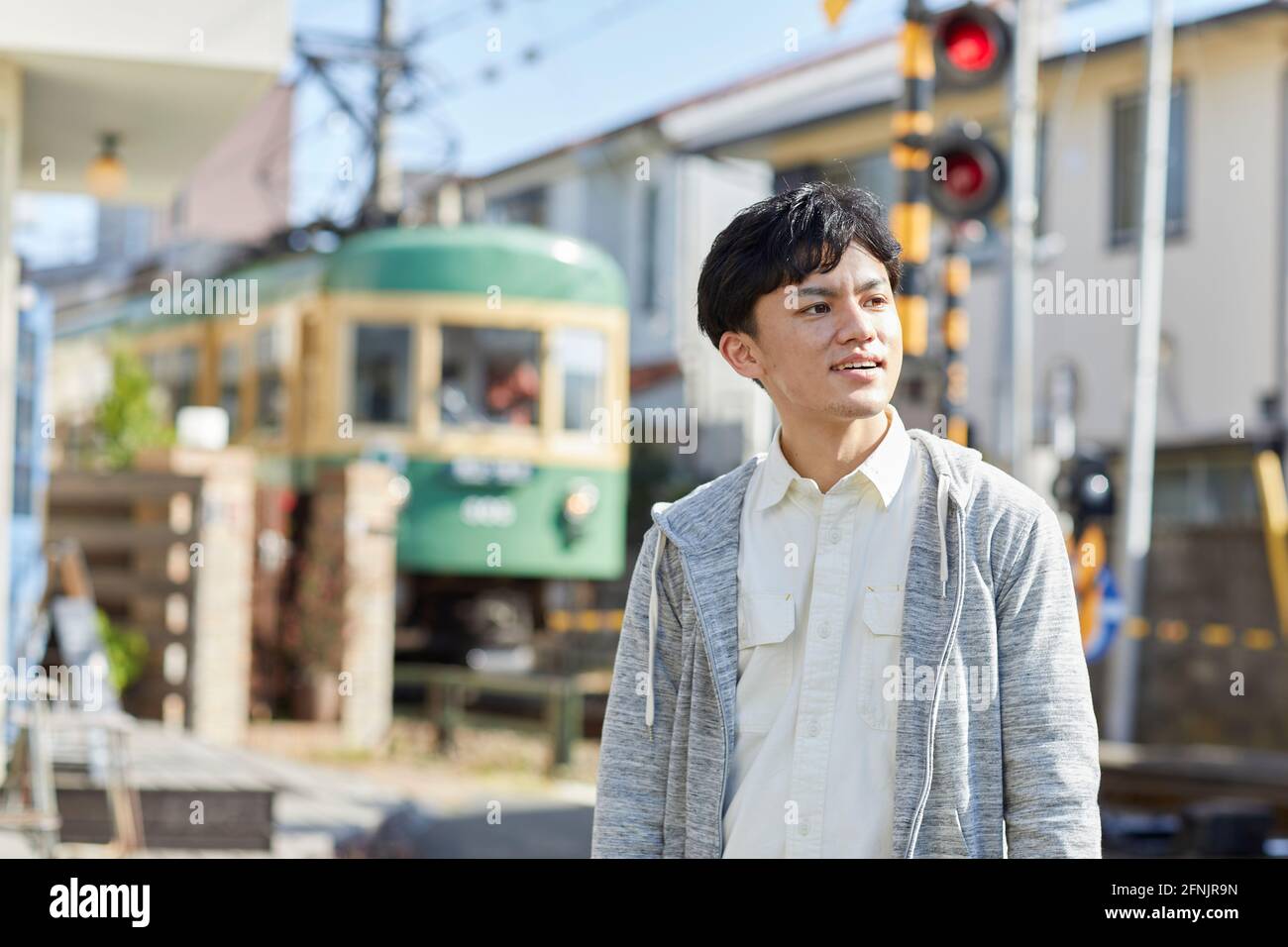 Japanese man and old train Stock Photo - Alamy