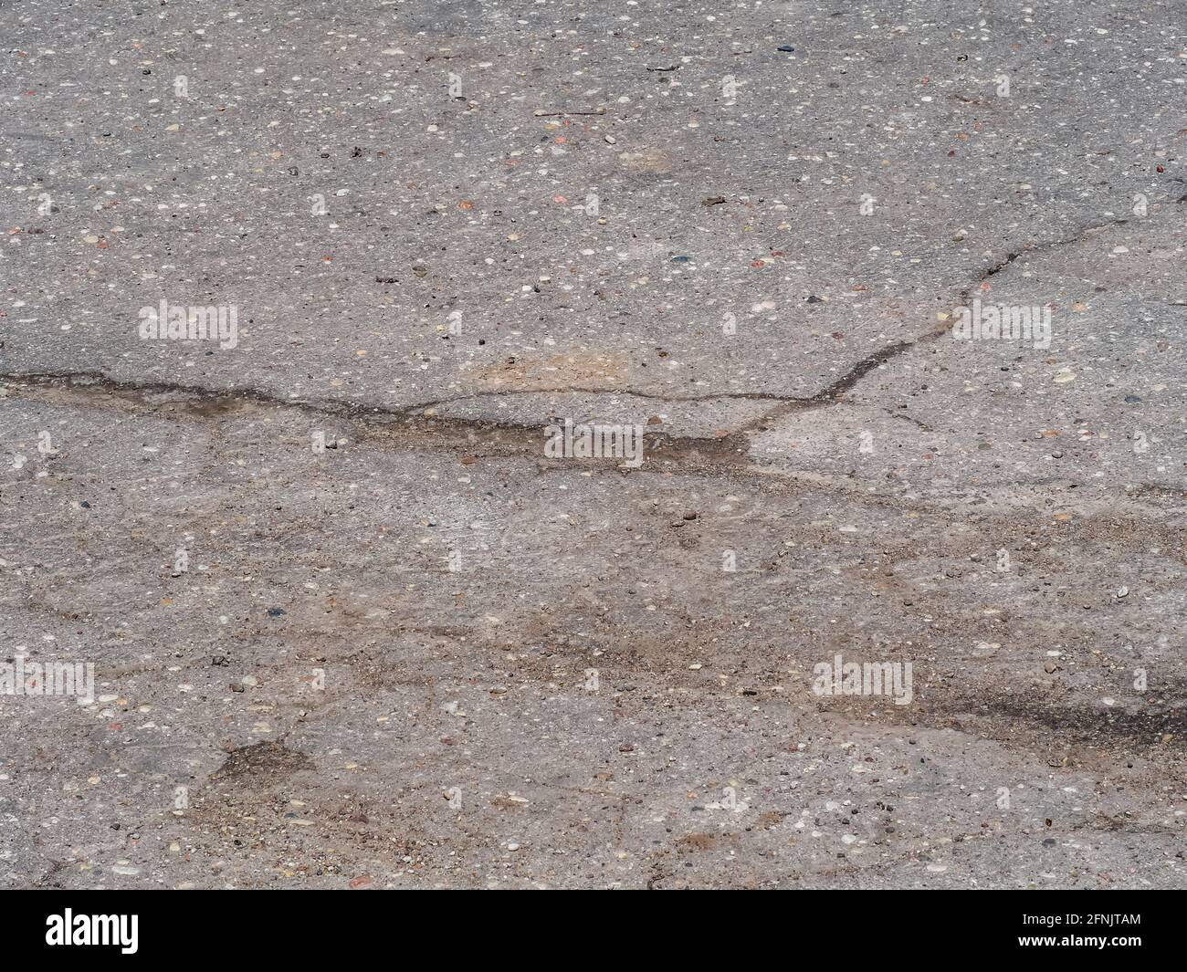 Cracks on a stone ground Stock Photo - Alamy