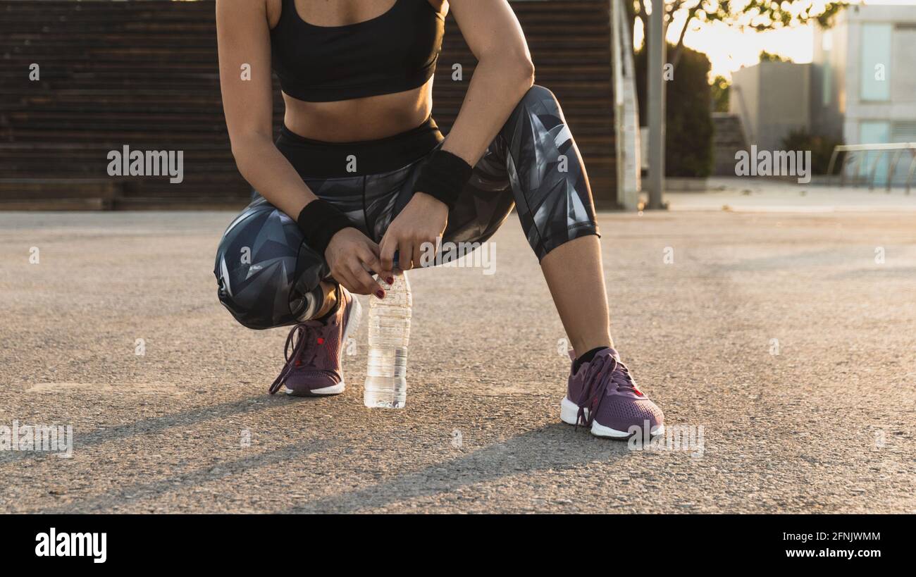 Woman competition track resting hi-res stock photography and images - Alamy