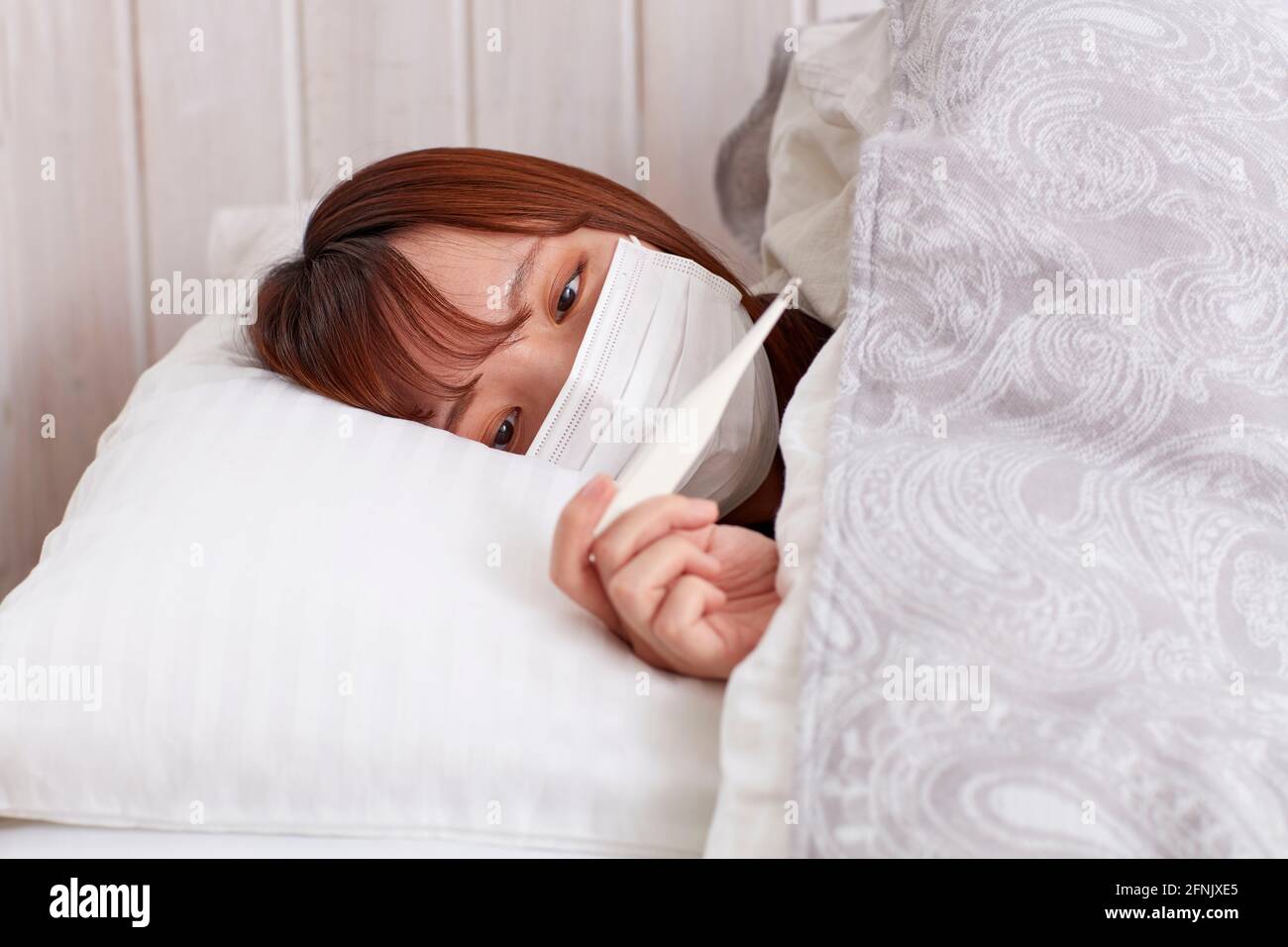 Japanese Women Vomit Sick Japanese Woman At Home Stock Photo Alamy