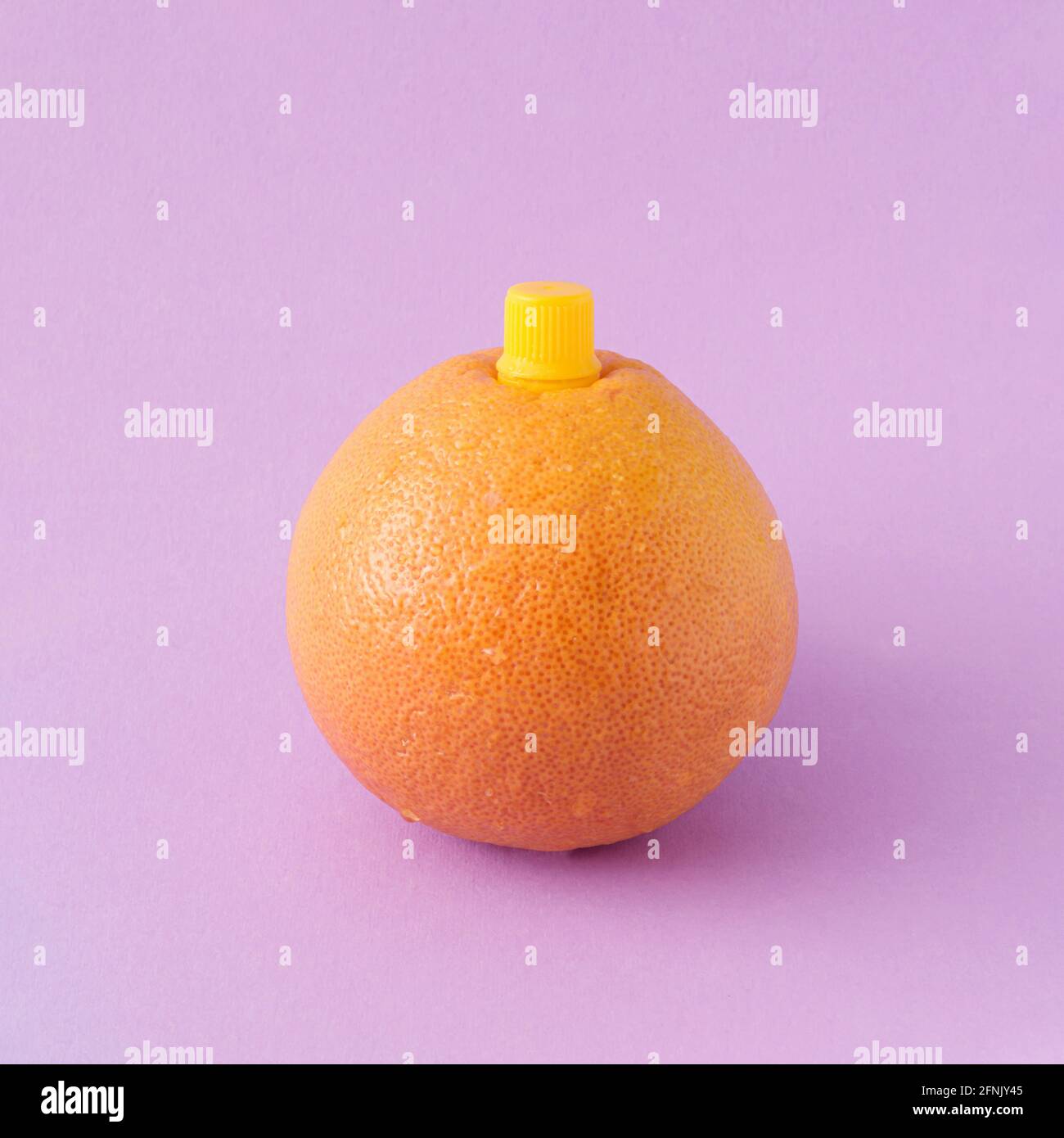 Grape on which there is a juice stopper with a lid on a purple ...