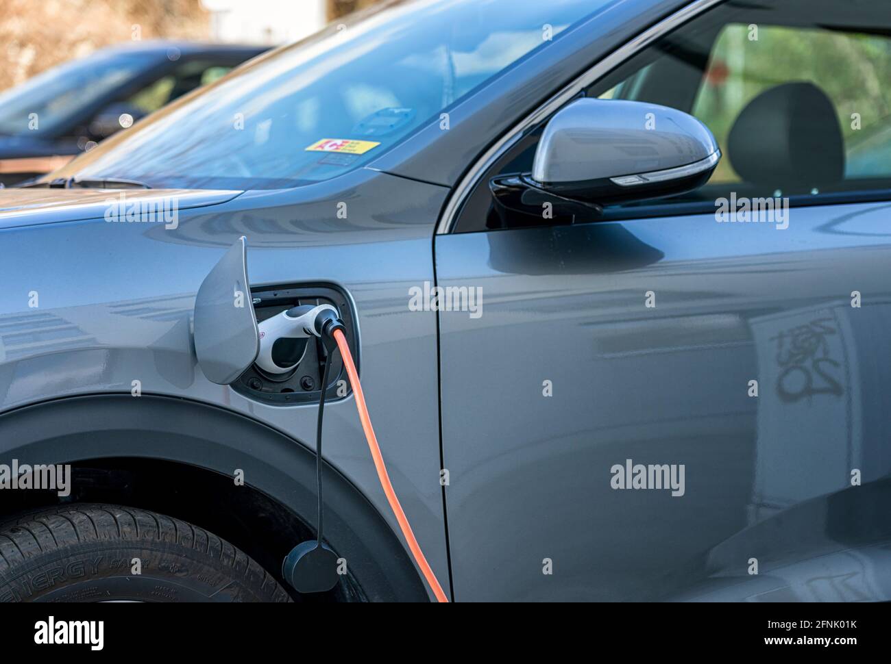 Charging Cable On An Electric Car Stock Photo - Alamy