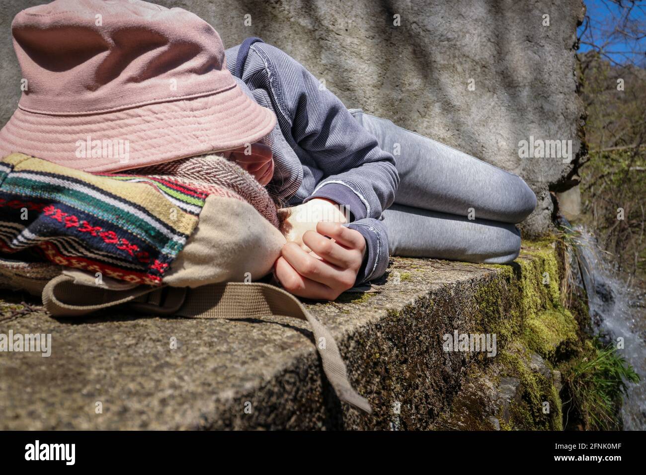 Woman laying down on concrete hi-res stock photography and images - Alamy