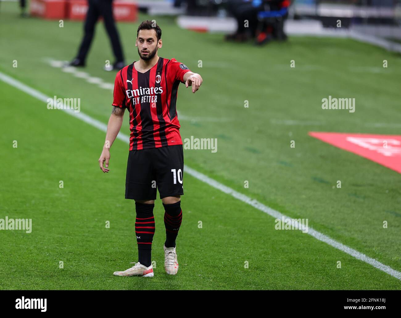 Hakan Calhanoglu of AC Milan gestures during the Serie A 2020/21 ...