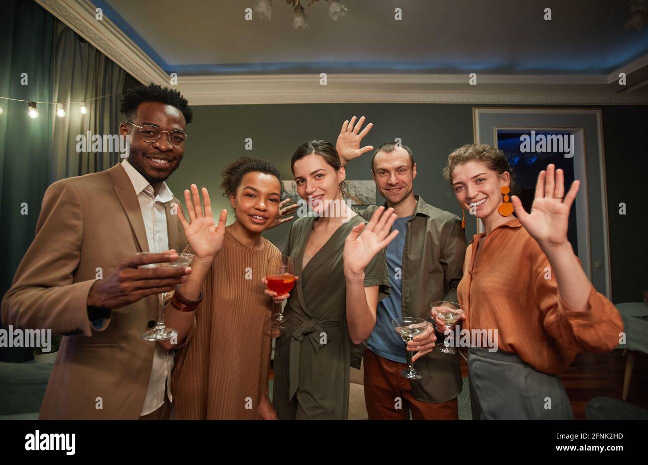 People waving hi-res stock photography and images - Alamy