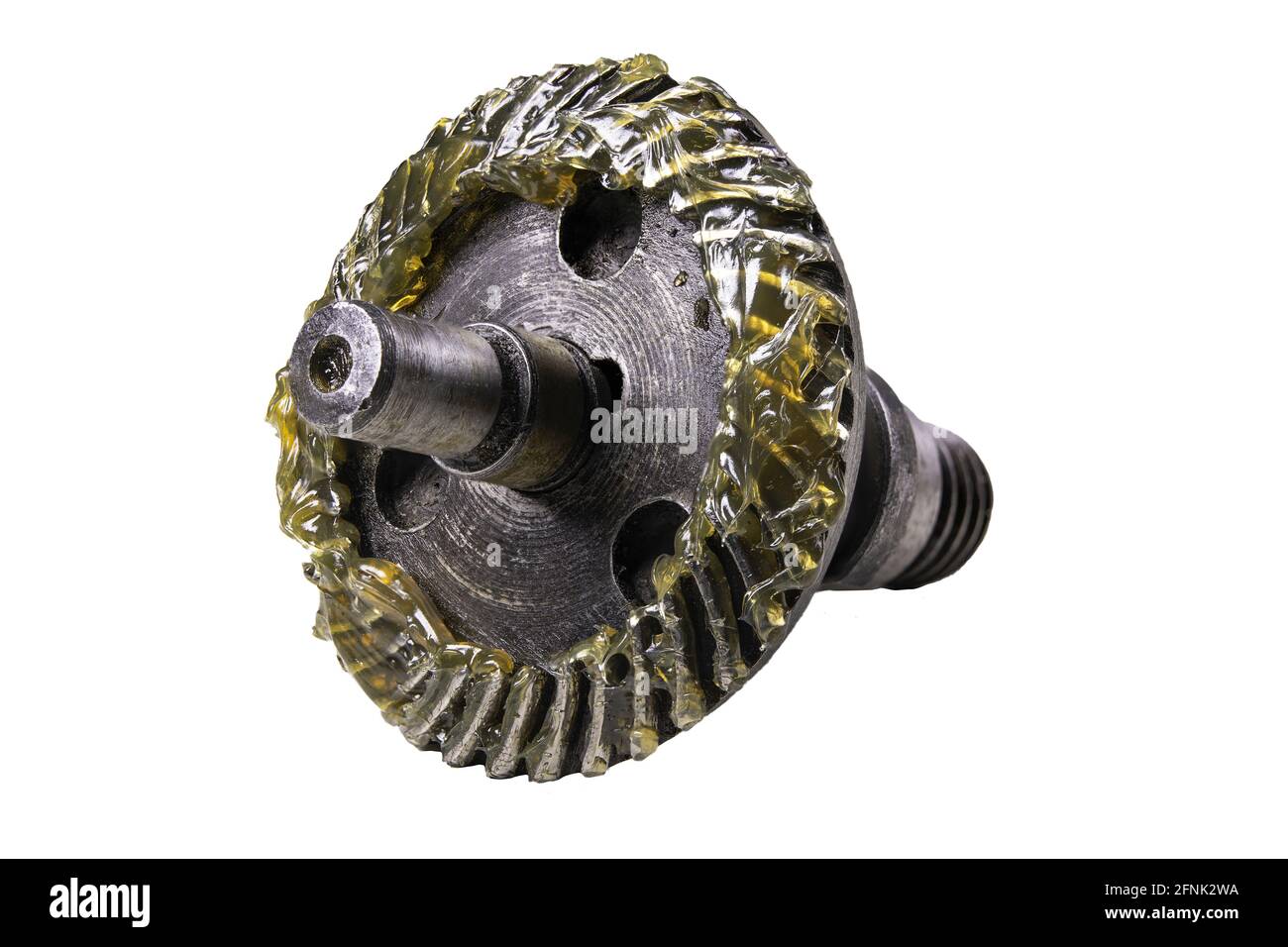 Metal gear wheel coated with machine grease. Spare parts for machines ...