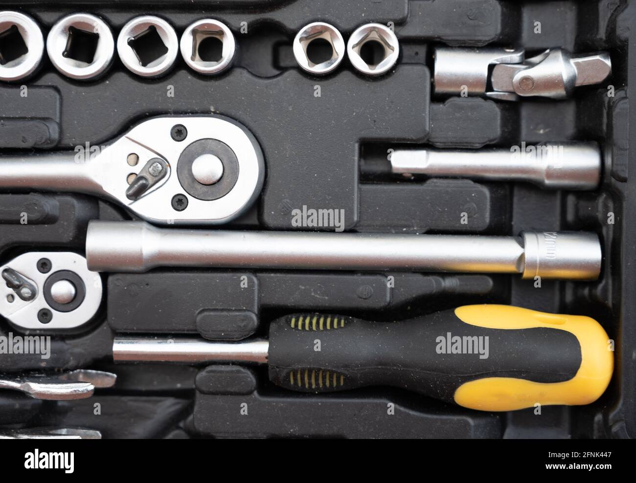 A set of black and yellow tools Stock Photo - Alamy
