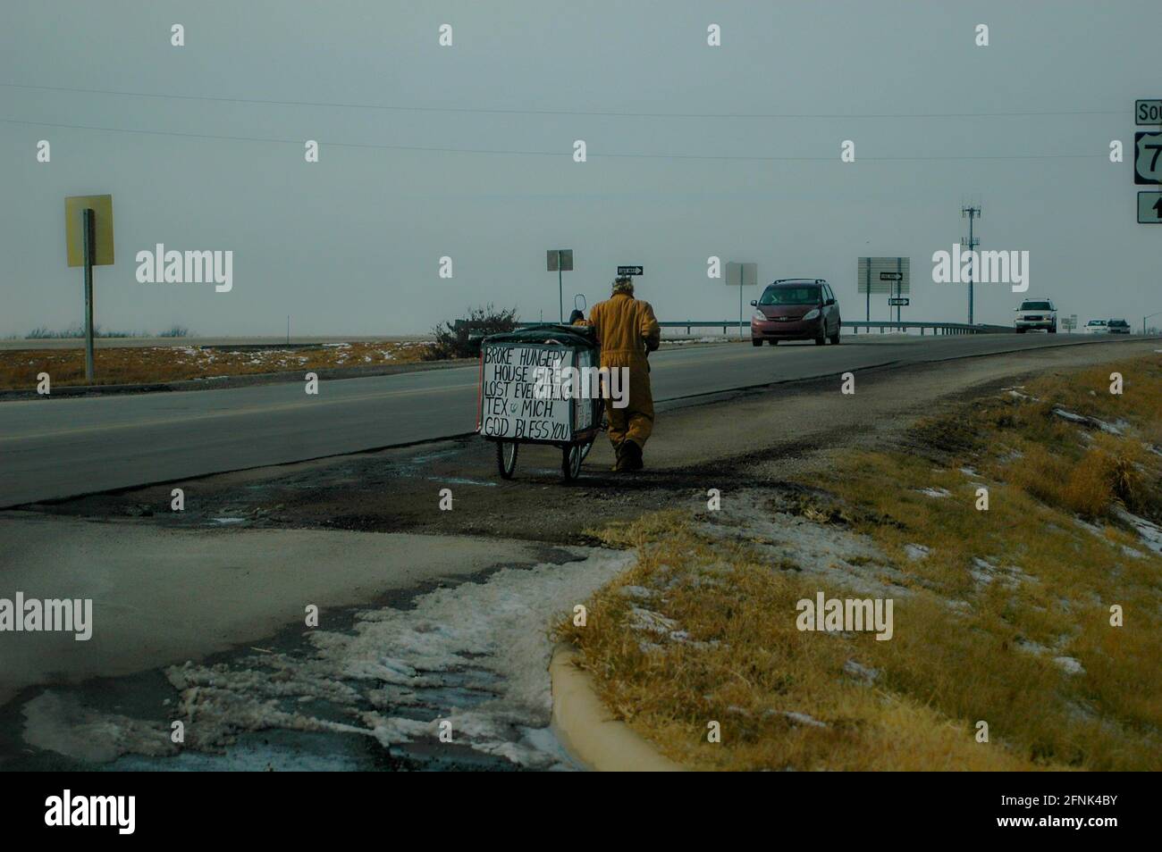 man walking on a highway Stock Photo - Alamy