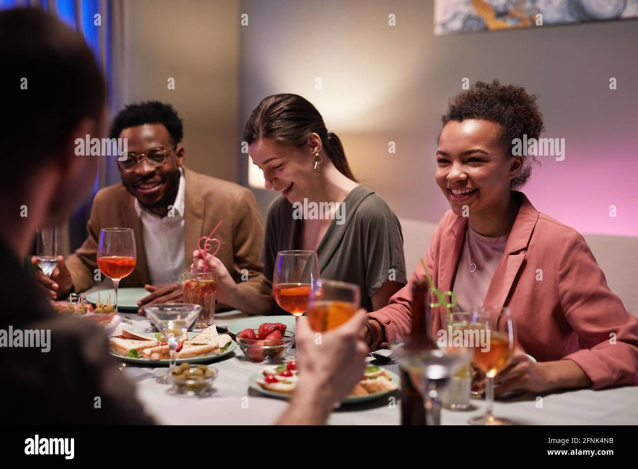 Group diverse people dinner party hi-res stock photography and images ...
