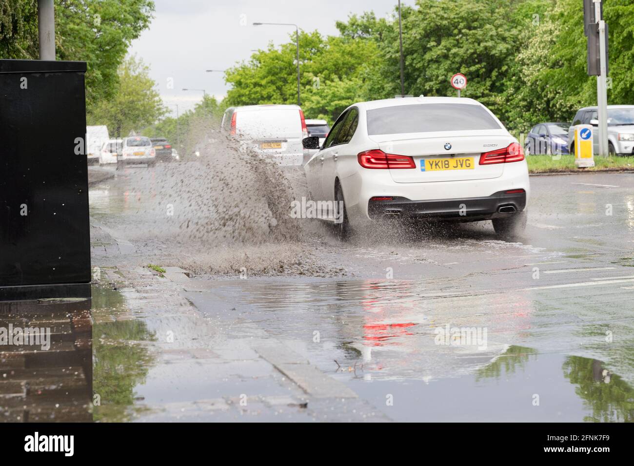 white BMW makes Splash from flash flood on south circular road, greater ...
