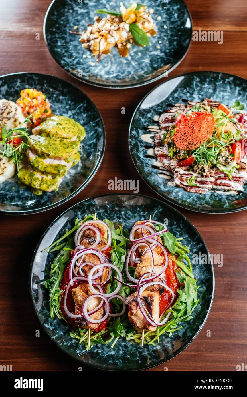 meat and vegetables on a plate. menu. top view Stock Photo - Alamy