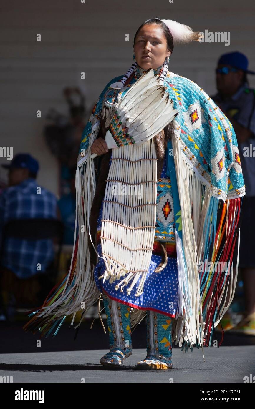 Female indigenous dancer in Elbow River Camp, a First Nations display ...