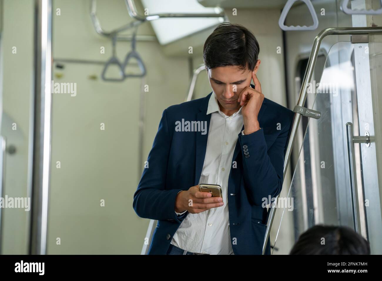 Asian man public transport hi-res stock photography and images - Alamy
