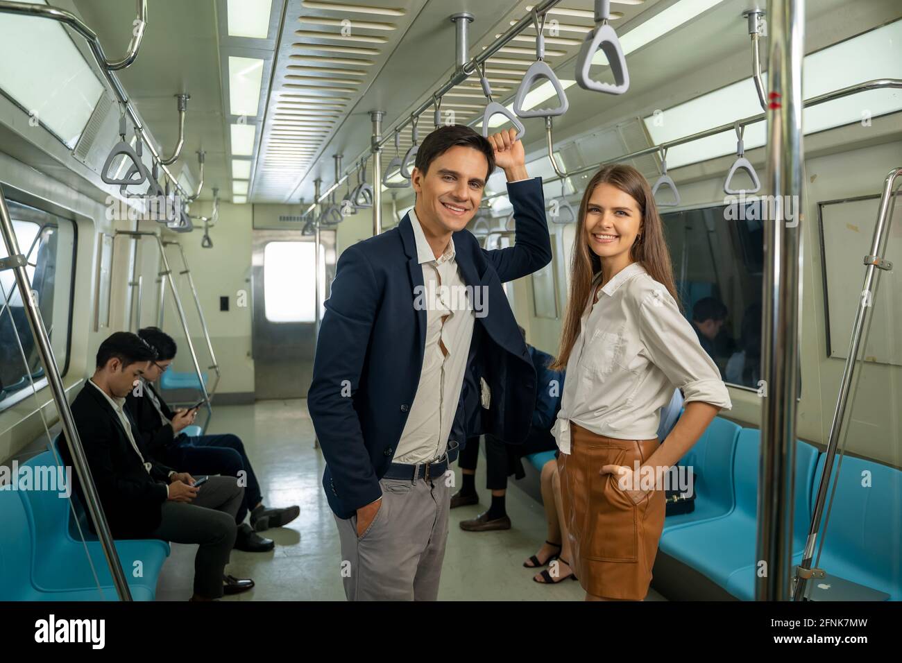 Corporate business people commuting to work by public transport Stock ...