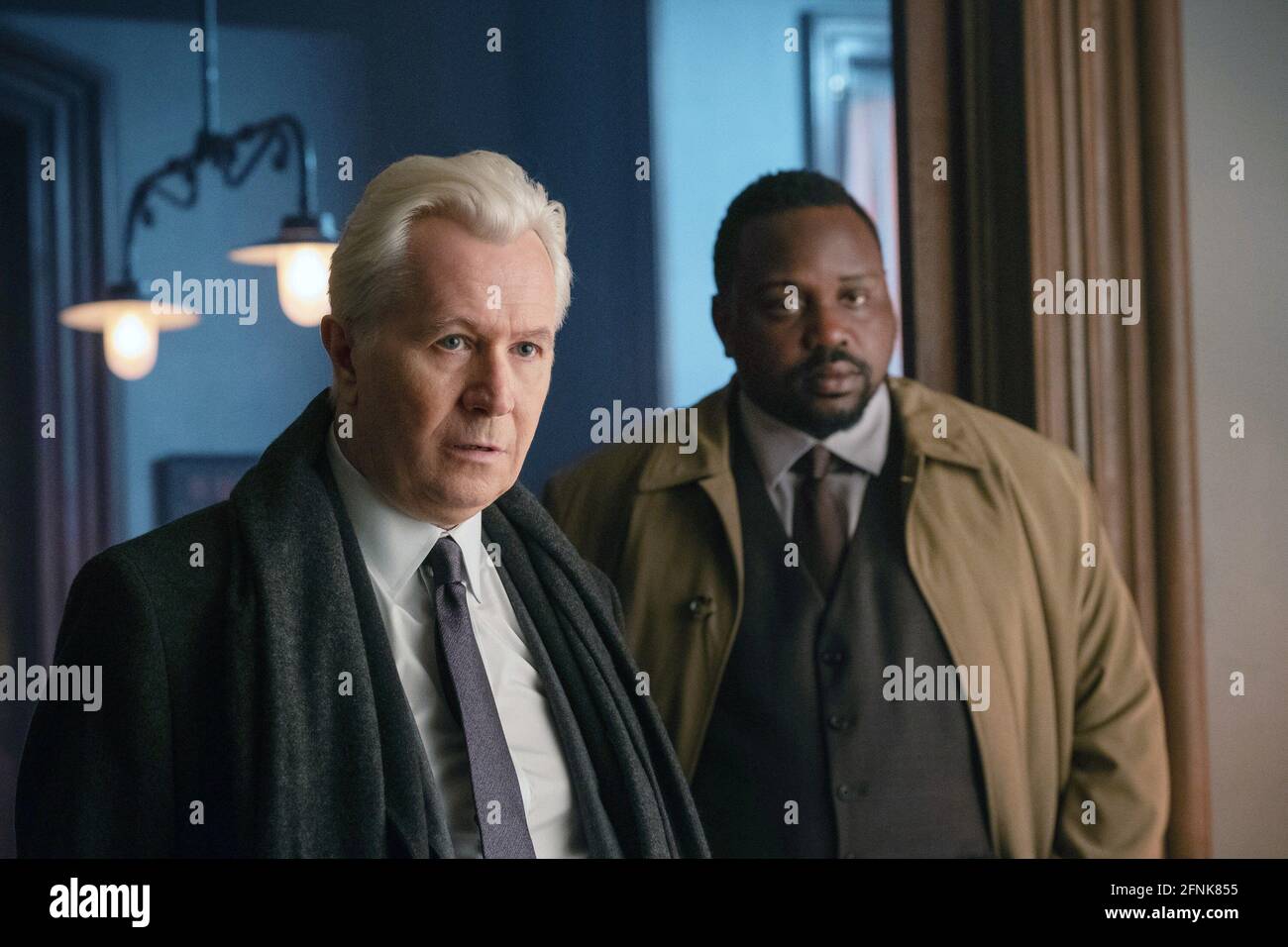 THE WOMAN IN THE WINDOW, from left: Gary Oldman, Brian Tyree Henry ...