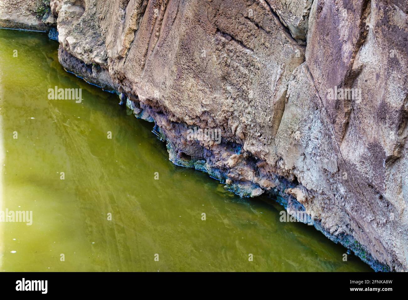 Hard rock formation by the lake Stock Photo - Alamy