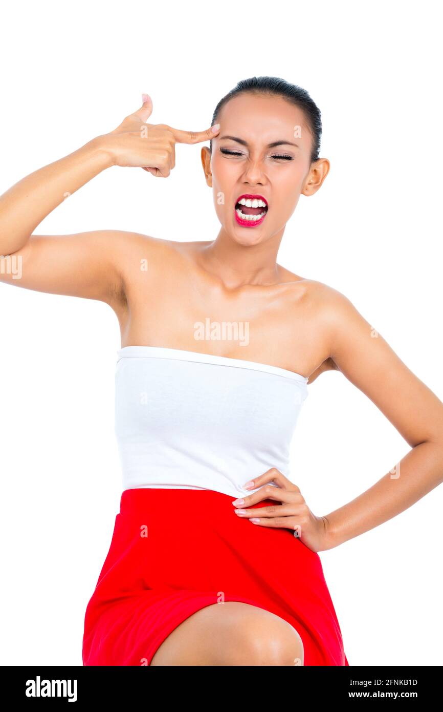 Young Asian woman showing emotions and showing the idiot sign Stock ...