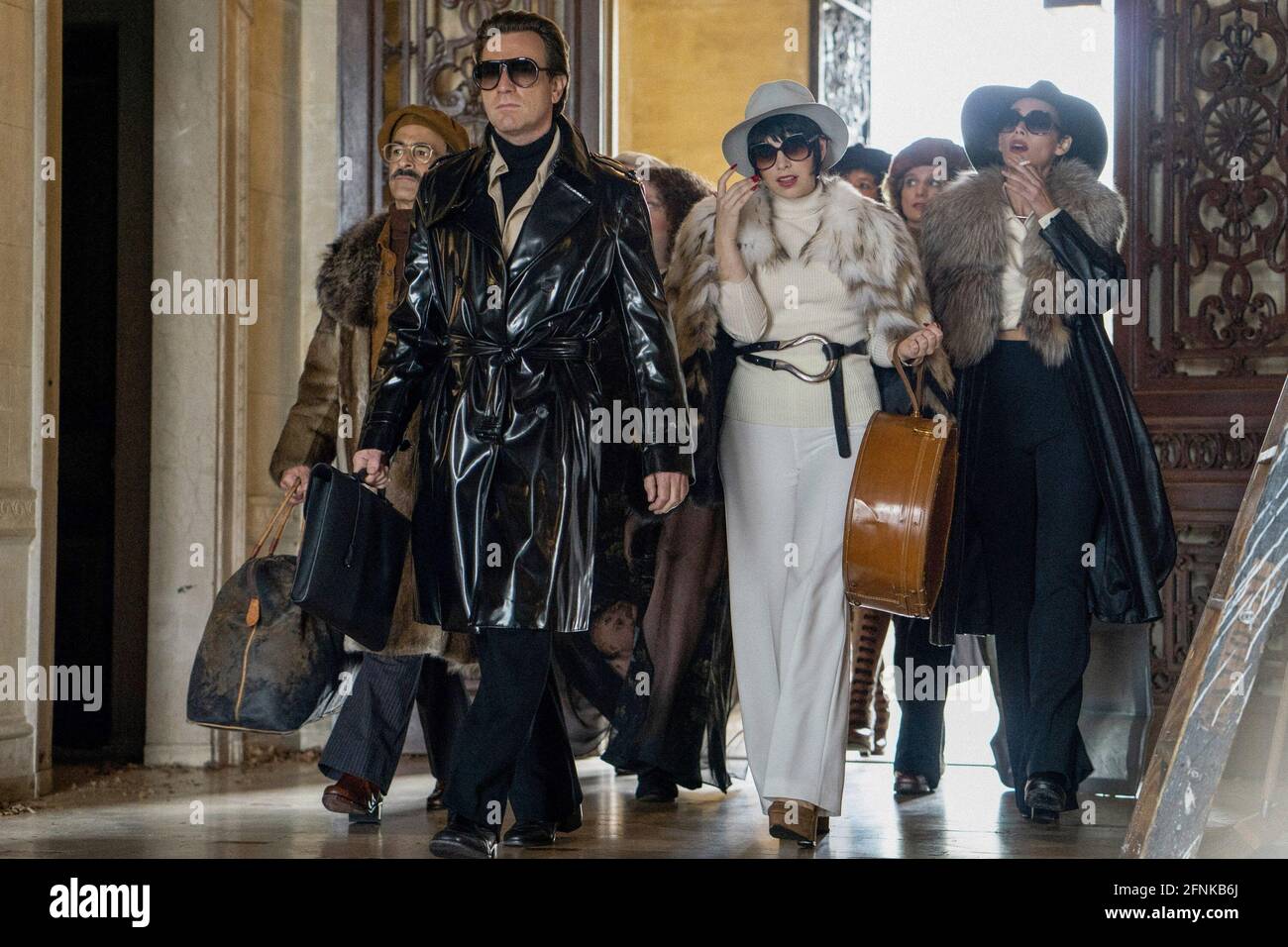 HALSTON, from left: David Pittu as Joe Eula, Ewan McGregor as Halston ...