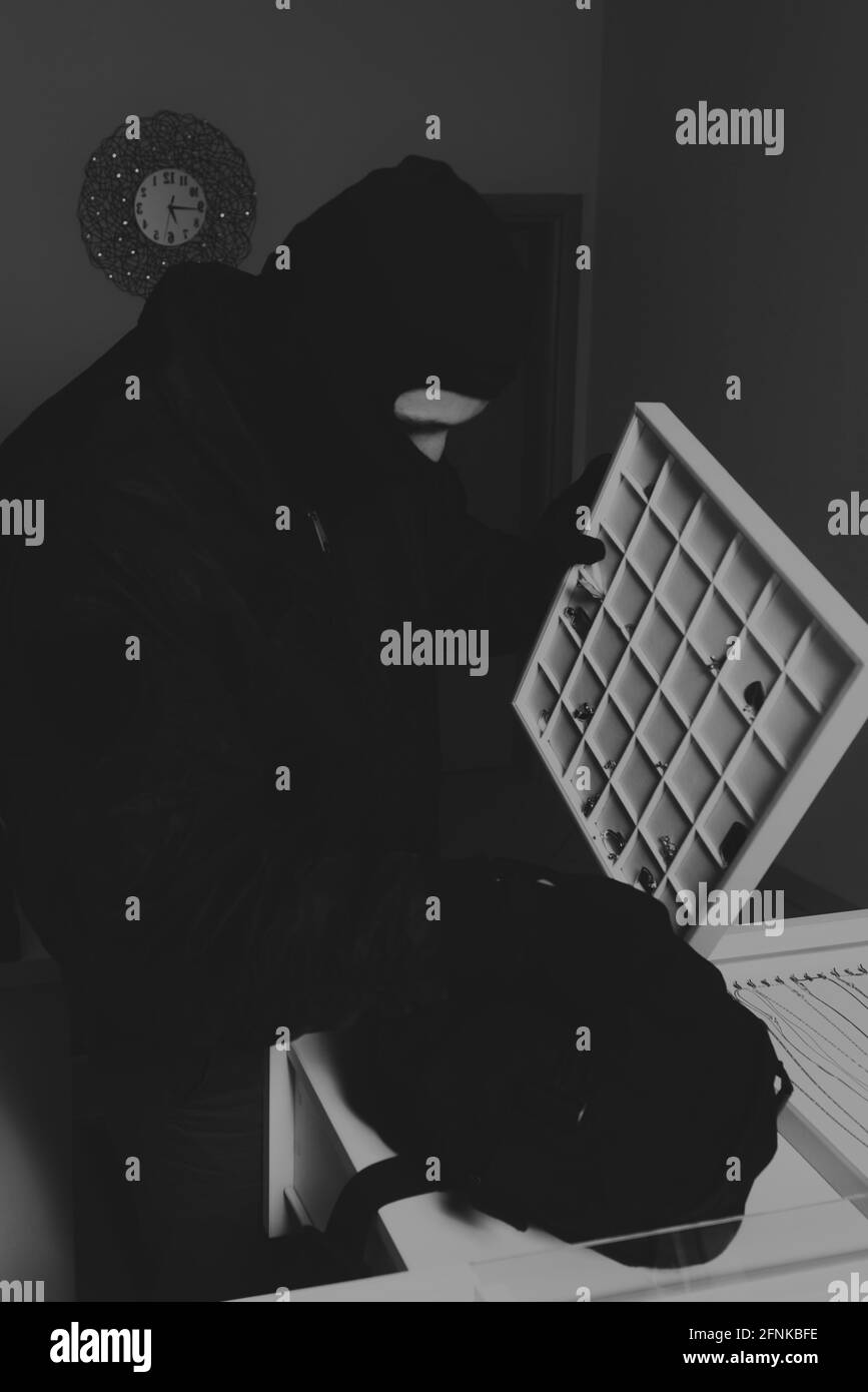 Man Wearing a Mask Robbed a Jewelry Store - Robbery Concept Stock Photo ...