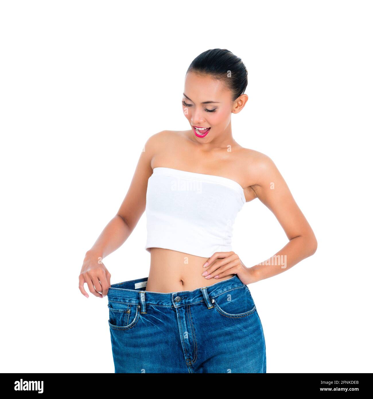 Young Asian woman losing weight by living healthy Stock Photo - Alamy
