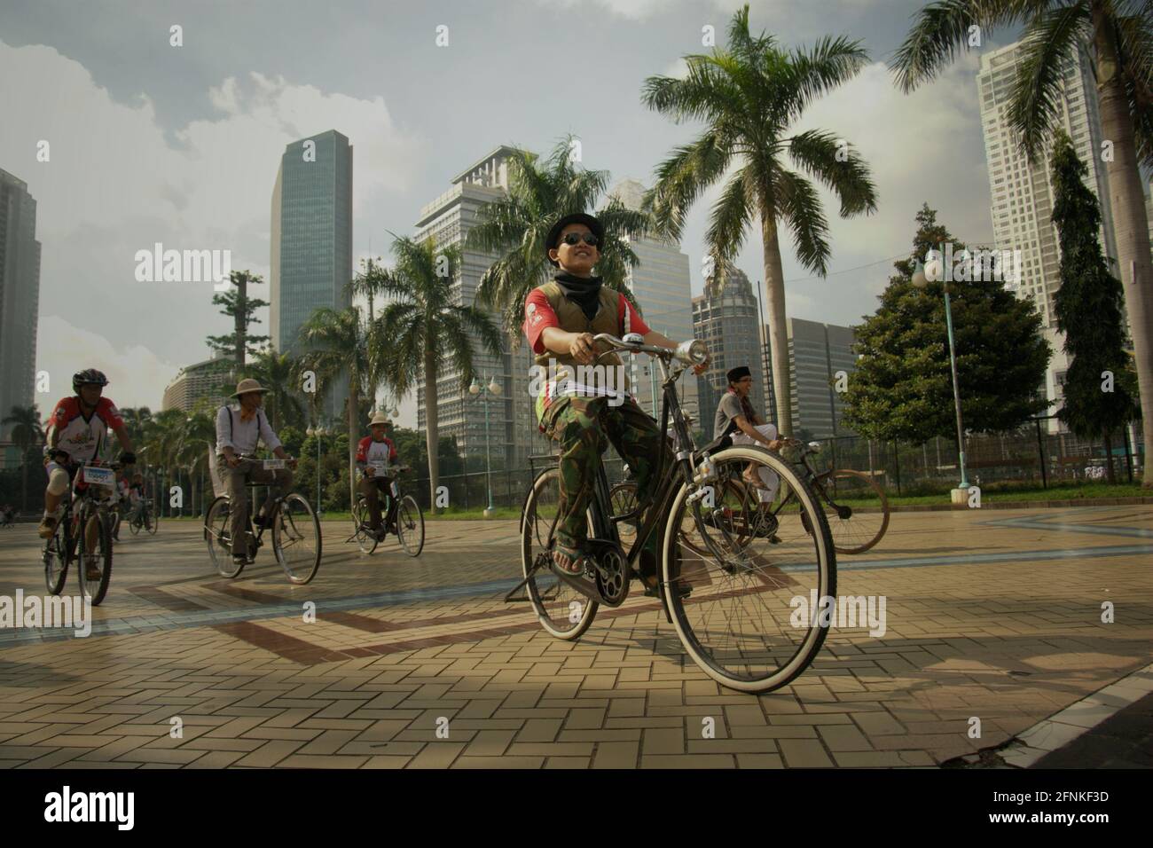 Cycling enthusiasts touring in Gelora Bung Karno (Senayan Sports ...