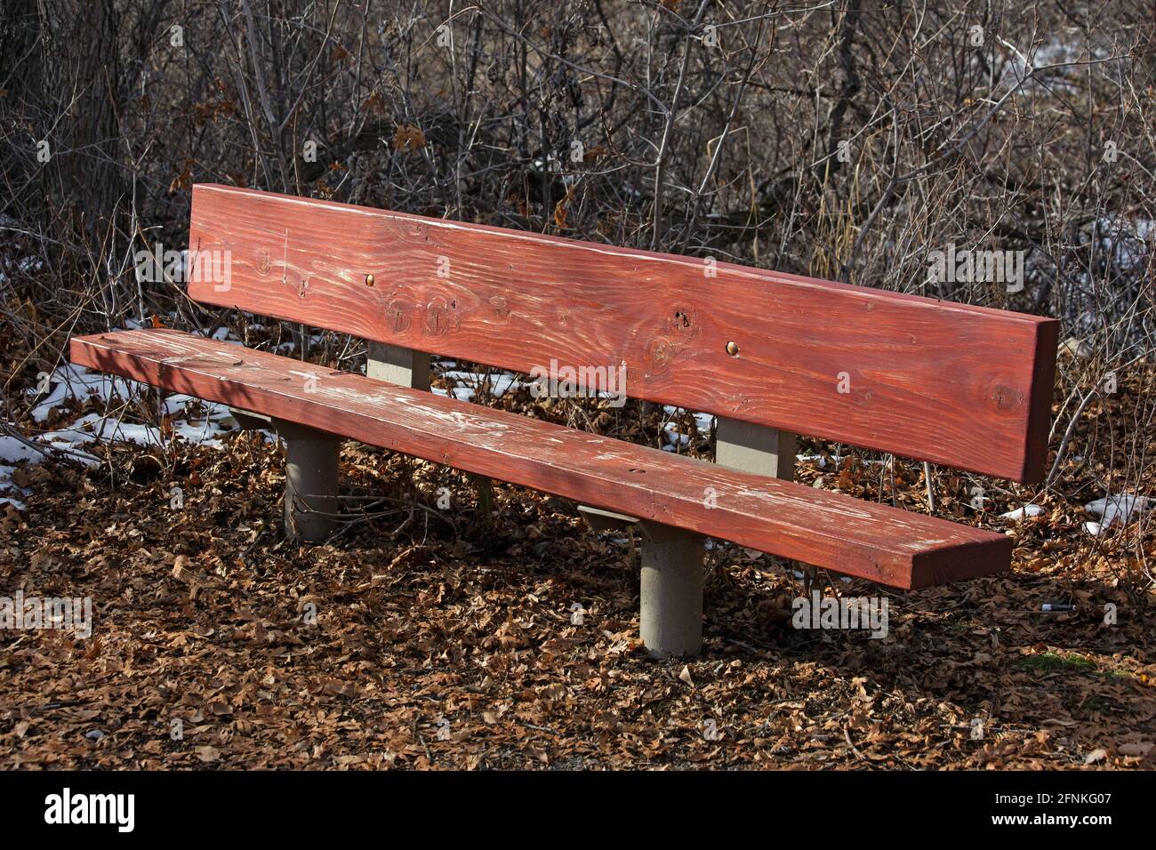 Closeup shot of a red bench in the park Stock Photo - Alamy