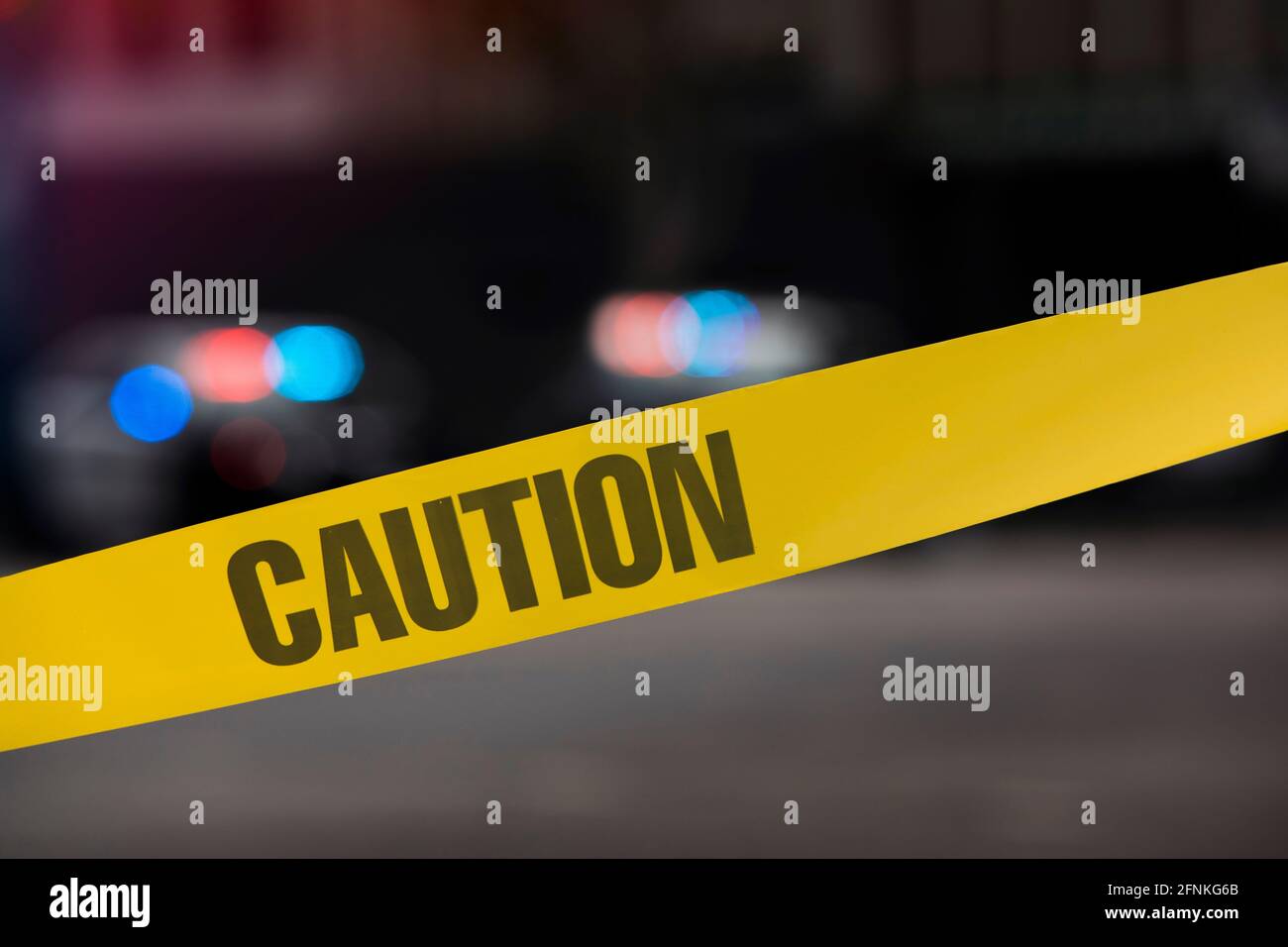 Cordon tape seals off a scene of an incident Stock Photo - Alamy