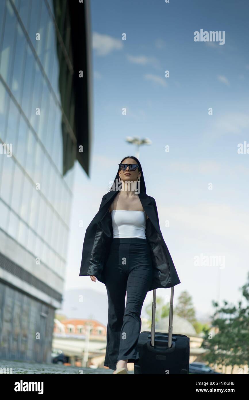 Attractive businesswoman is going to meet with ehr partners Stock Photo ...