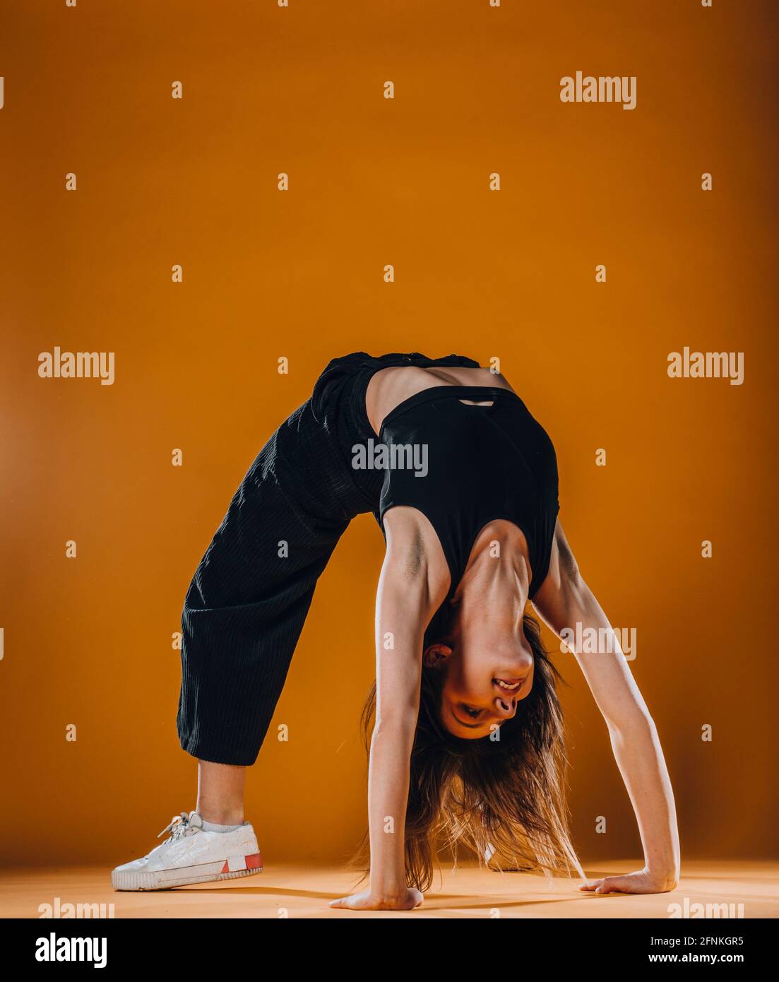 Young dance performer practicing a contemporary dance Stock Photo - Alamy
