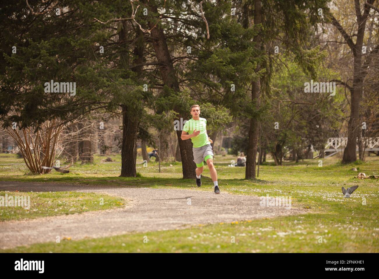 Strong sportsman running around hi-res stock photography and images - Alamy