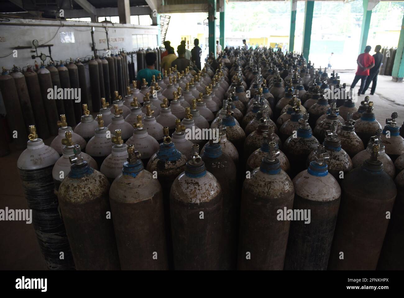 Guwahati, Assam, India. 17th May, 2021. Workers busey in filing oxygen ...