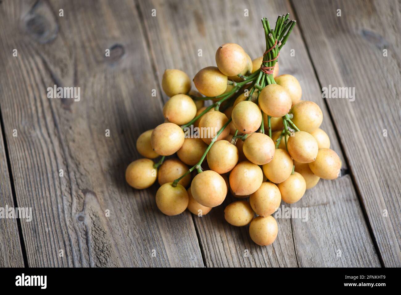 Rambi harvest from tree at the garden summer tropical fruit in Thailand ...