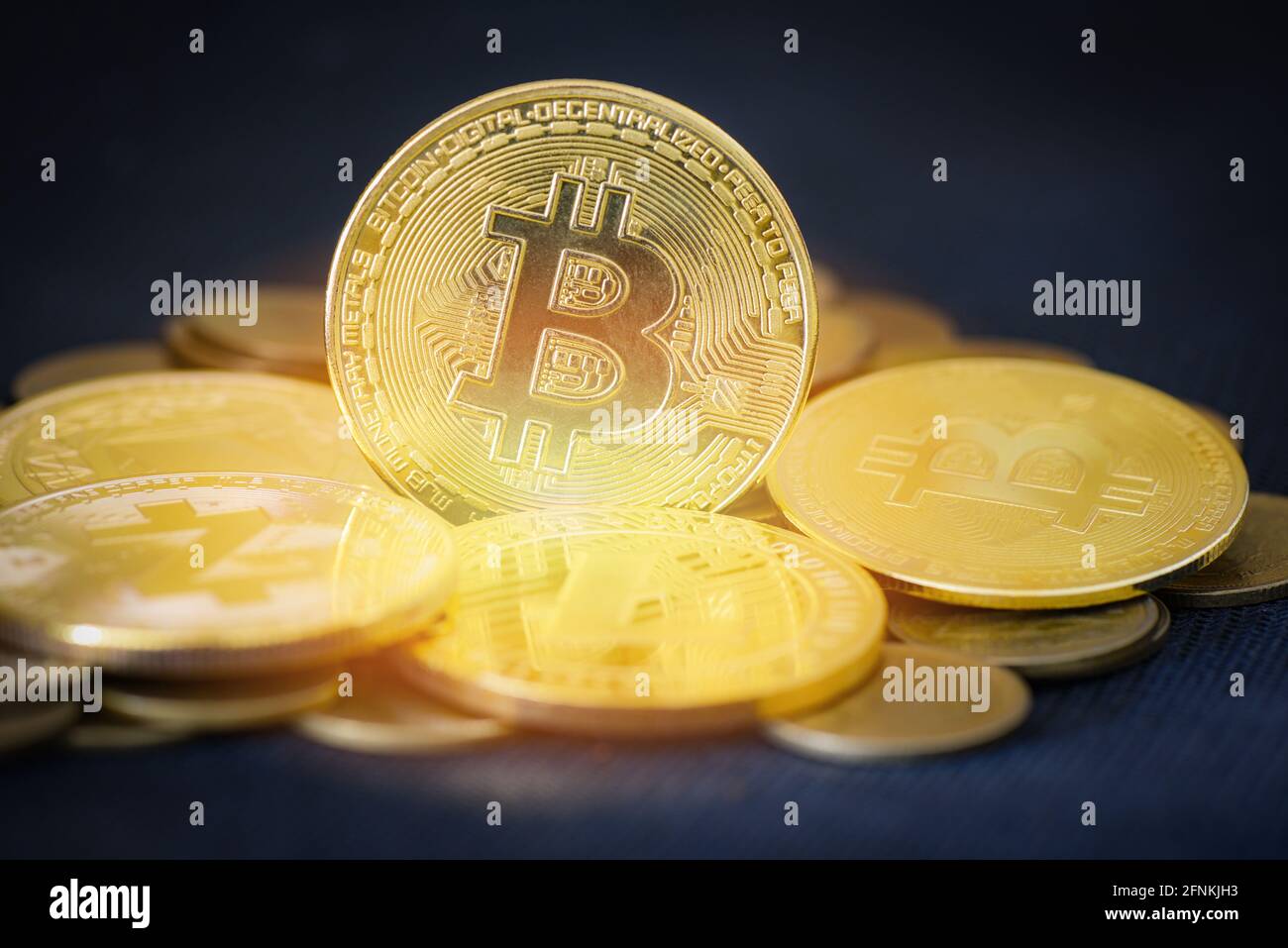 Pile of golden BTC cryptocurrency trading virtual money stock market ...