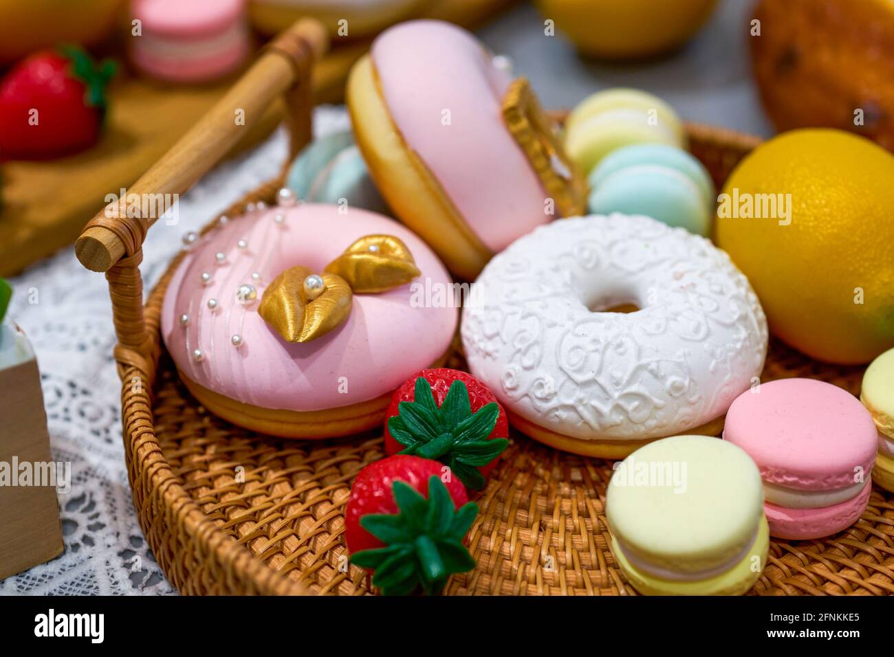 A platter of macarons and donuts Stock Photo - Alamy